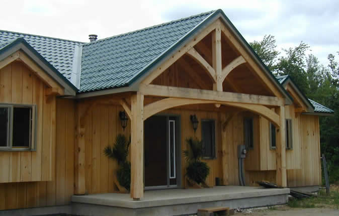 Timber Frame House with a Taiko Beam built in Memramcook, New Brunswick ...